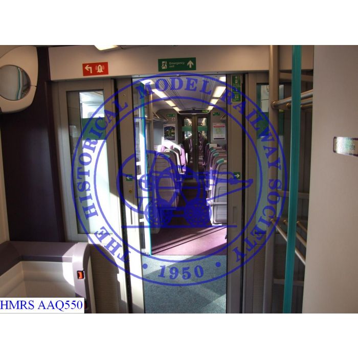 [AAQ550] 185125 DMU coach 54125 standing just inside First Class and ...