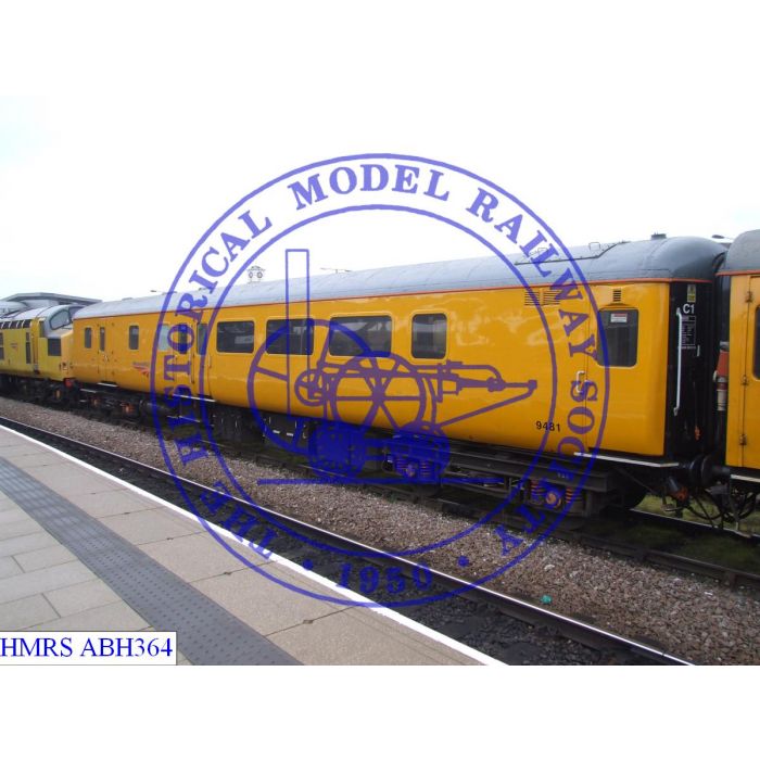 [ABH364] 9481 Network Rail MK2 carriage in yellow livery. Angled view ...