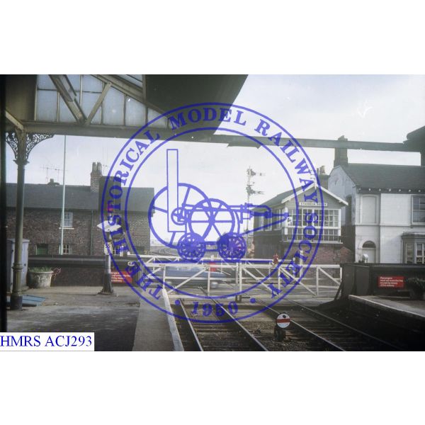 [ACJ293] Starbeck gated levXing with signal box beyond on right, seen ...